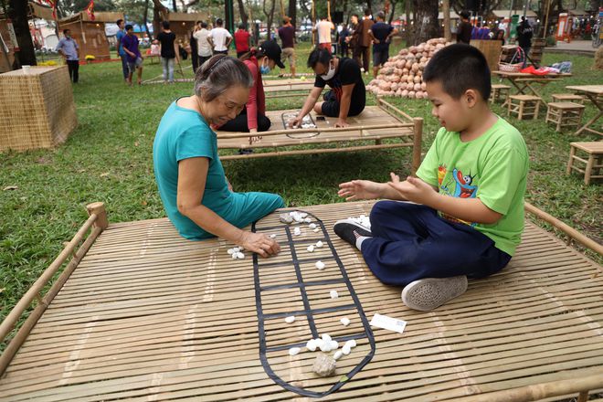 Celebrate Tet, play Tet, and go to the Tet market early at the ...