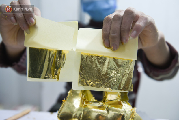 Close-up of the process of making a 24k gold-plated buffalo, priced at ...