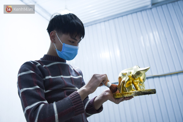 Close-up of the process of making a 24k gold-plated buffalo, priced at ...